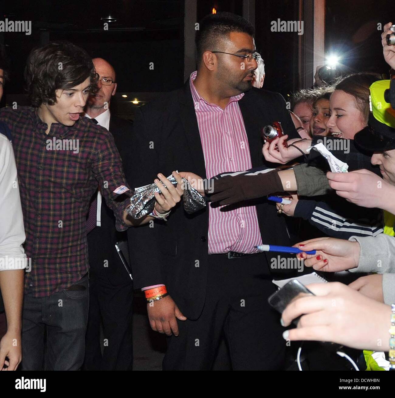Harry Styles of One Direction appears shocked and delighted to have ...