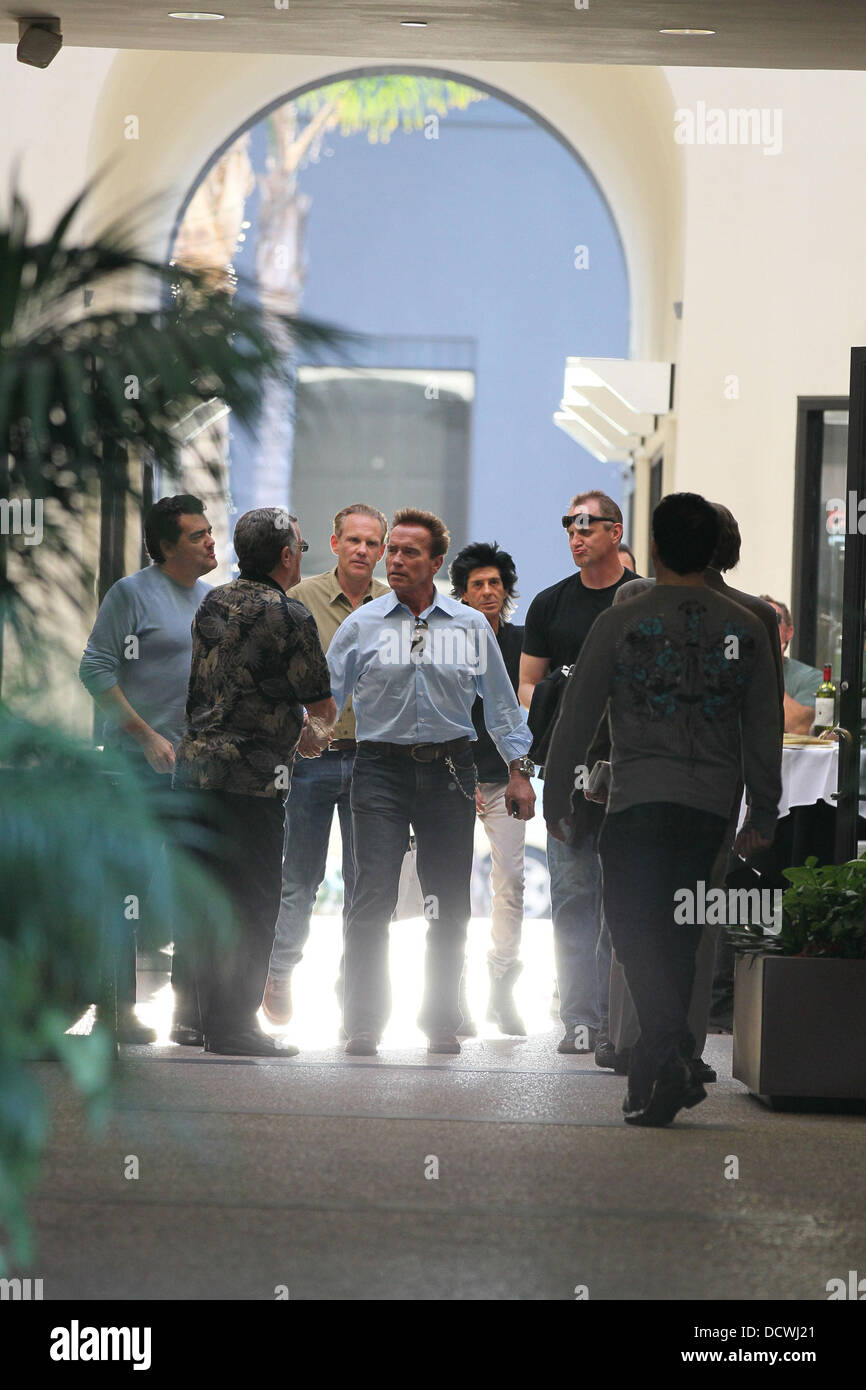Arnold Schwarzenegger has his hair cut at Giuseppe Franco Salon in ...