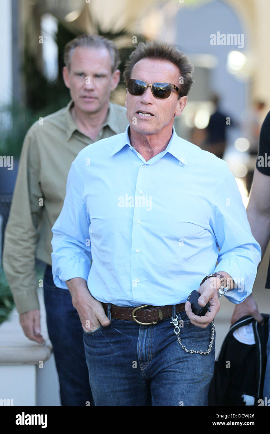 Arnold Schwarzenegger has his hair cut at Giuseppe Franco Salon in ...