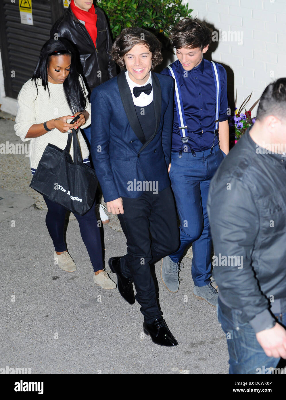 Harry Styles and Louis Tomlinson of One Direction 'The X Factor' judges ...