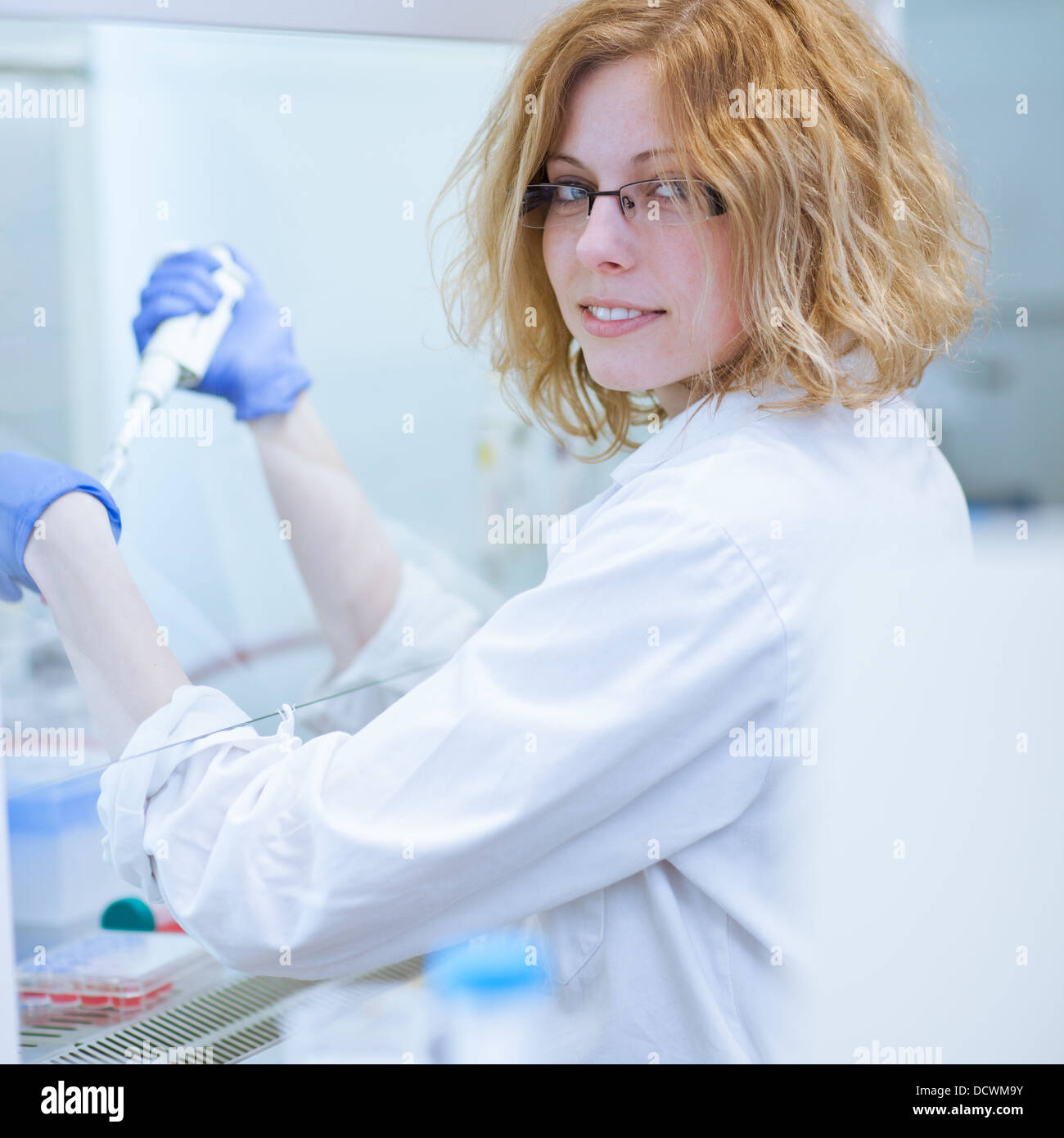 portrait of a female researcher doing research in a lab Stock Photo - Alamy