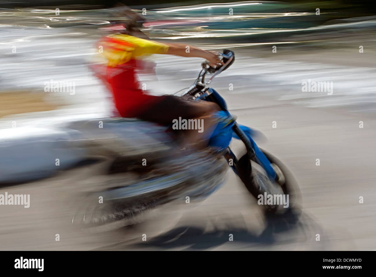 Abstract image with a moving motorcycle on blurred background Stock ...