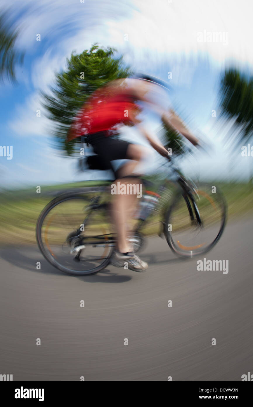 Cycling series: biker cycling outdoors (fisheye lens distortion Stock ...