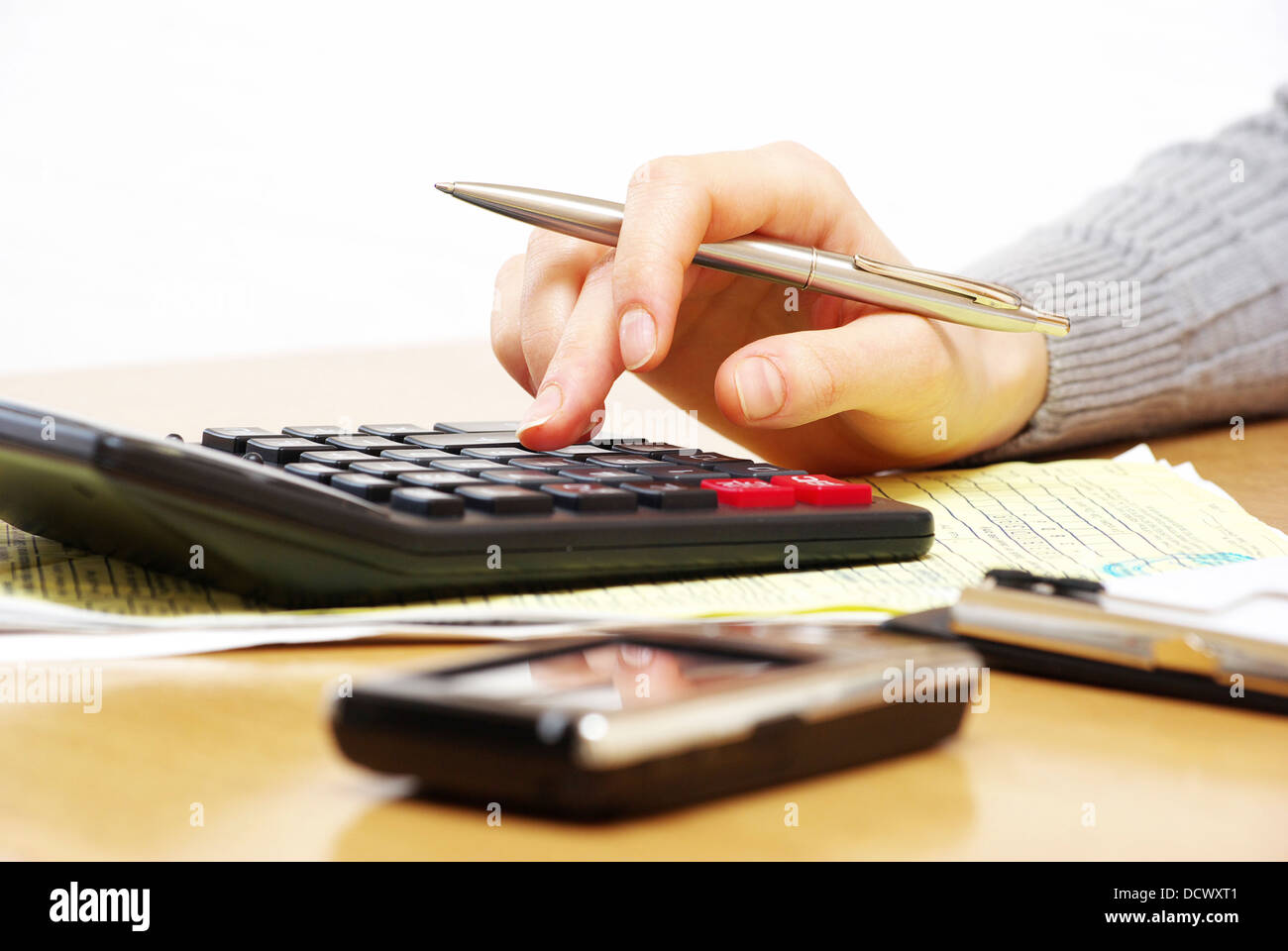 pen and calculator Stock Photo - Alamy