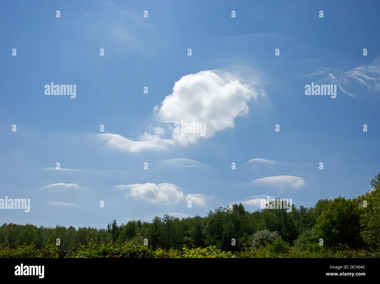 Unusual clouds in blue sky Stock Photo - Alamy