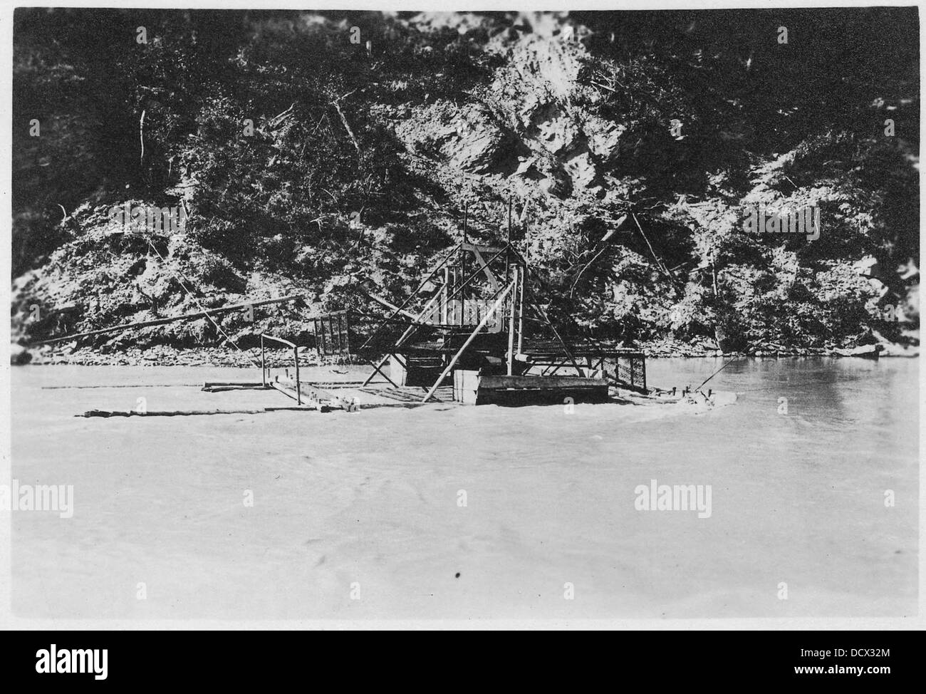 A fish-wheel operates on the Yukon River, used to catch fish ...
