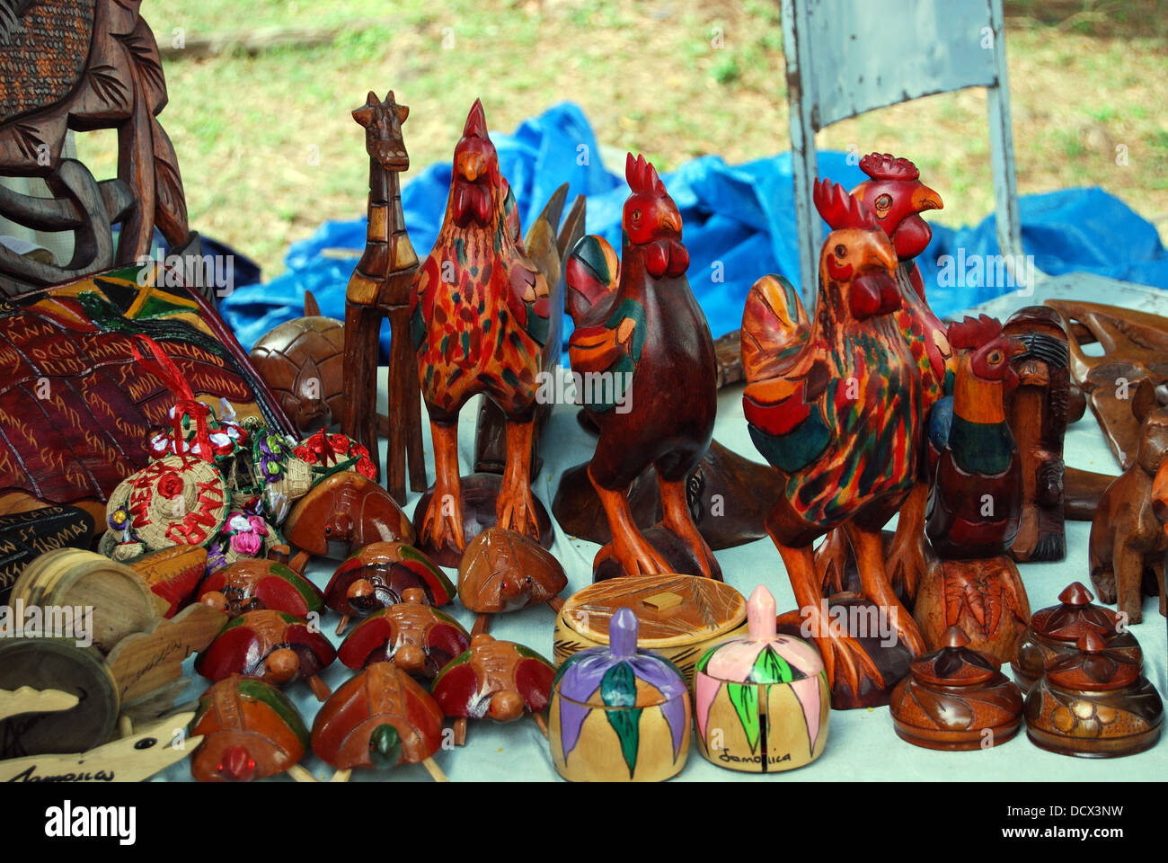 Carved wooden souvenirs for sale on the quayside, Montego Bay, Jamaica ...