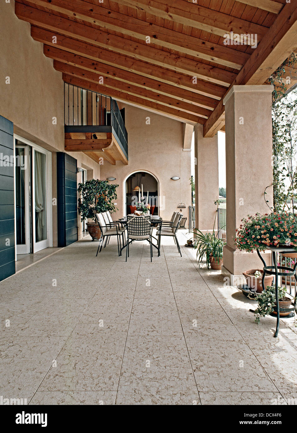 laid dining table under the porch of a rural residence Stock Photo - Alamy