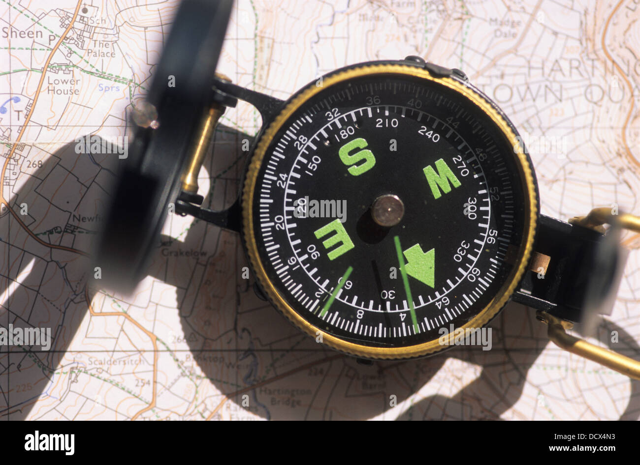 Compass on map Stock Photo - Alamy