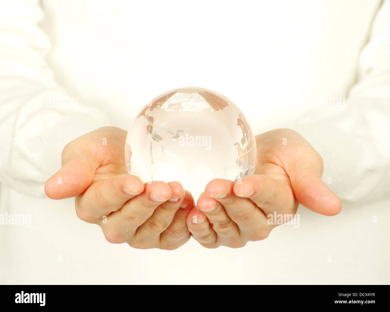 globe in hands Stock Photo - Alamy