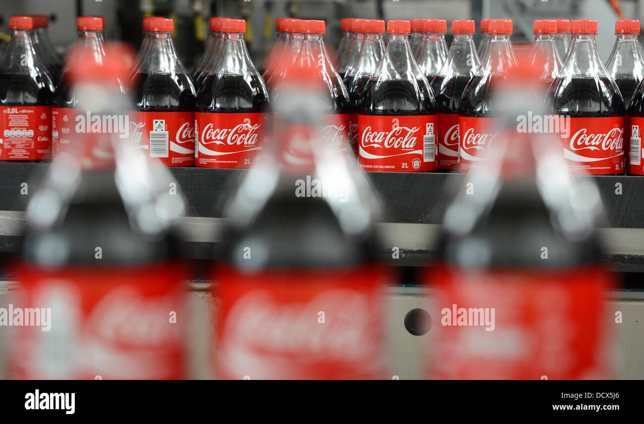 Two-liters Coca-Cola bottles are pictured on the production line in the ...