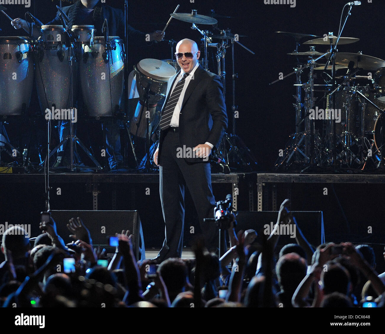 Pitbull performing live at the " Y100 Jingle Ball" at the Bank Atlantic ...