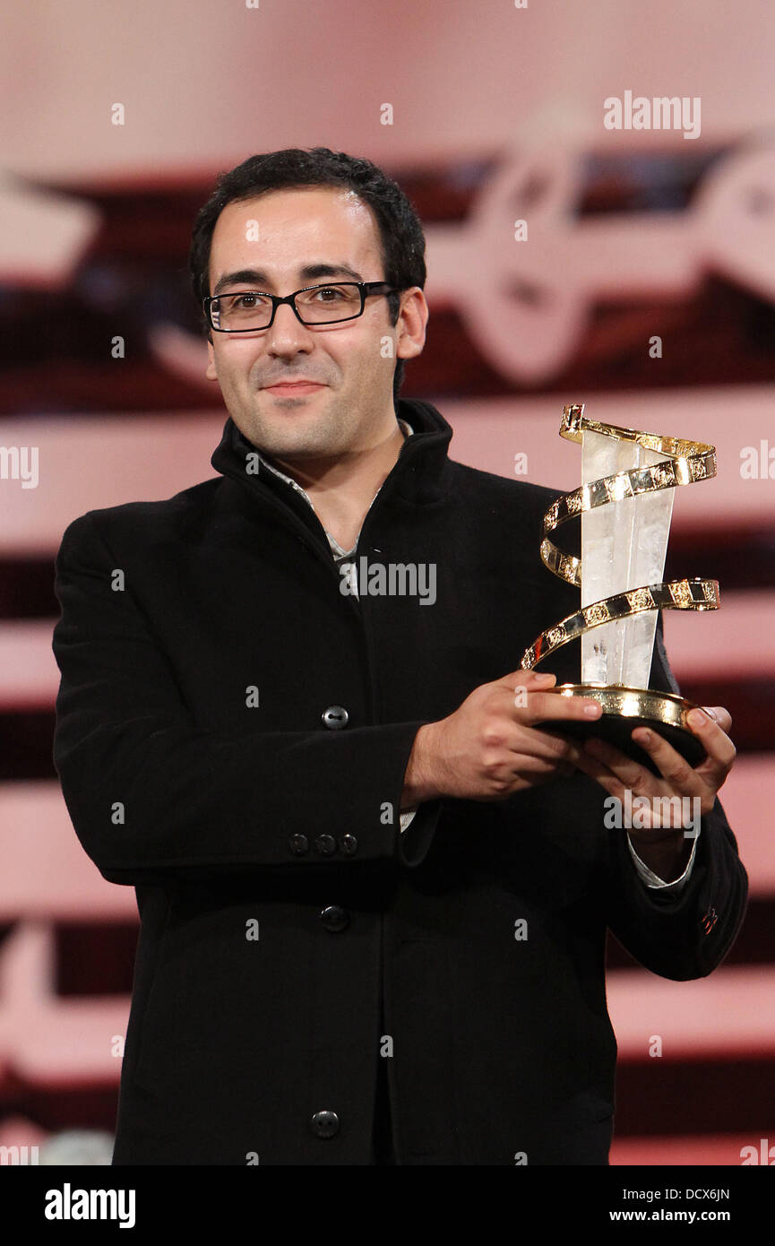 Director Mohamed Aouad poses after being awarded with the Cinecole ...