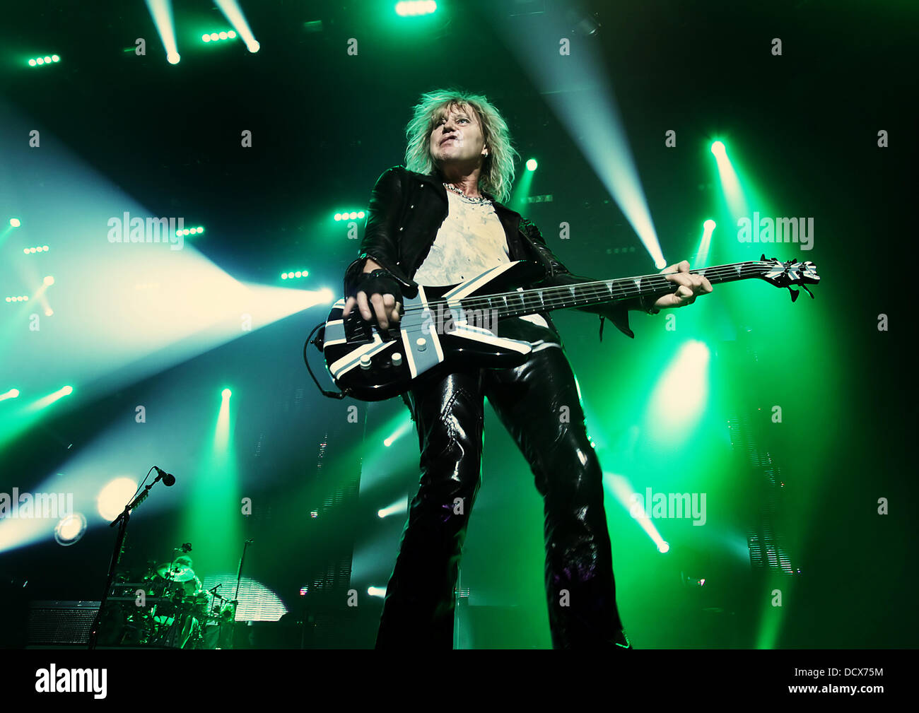 Rick Savage of Def Leppard performing live at Manchester Evening News ...