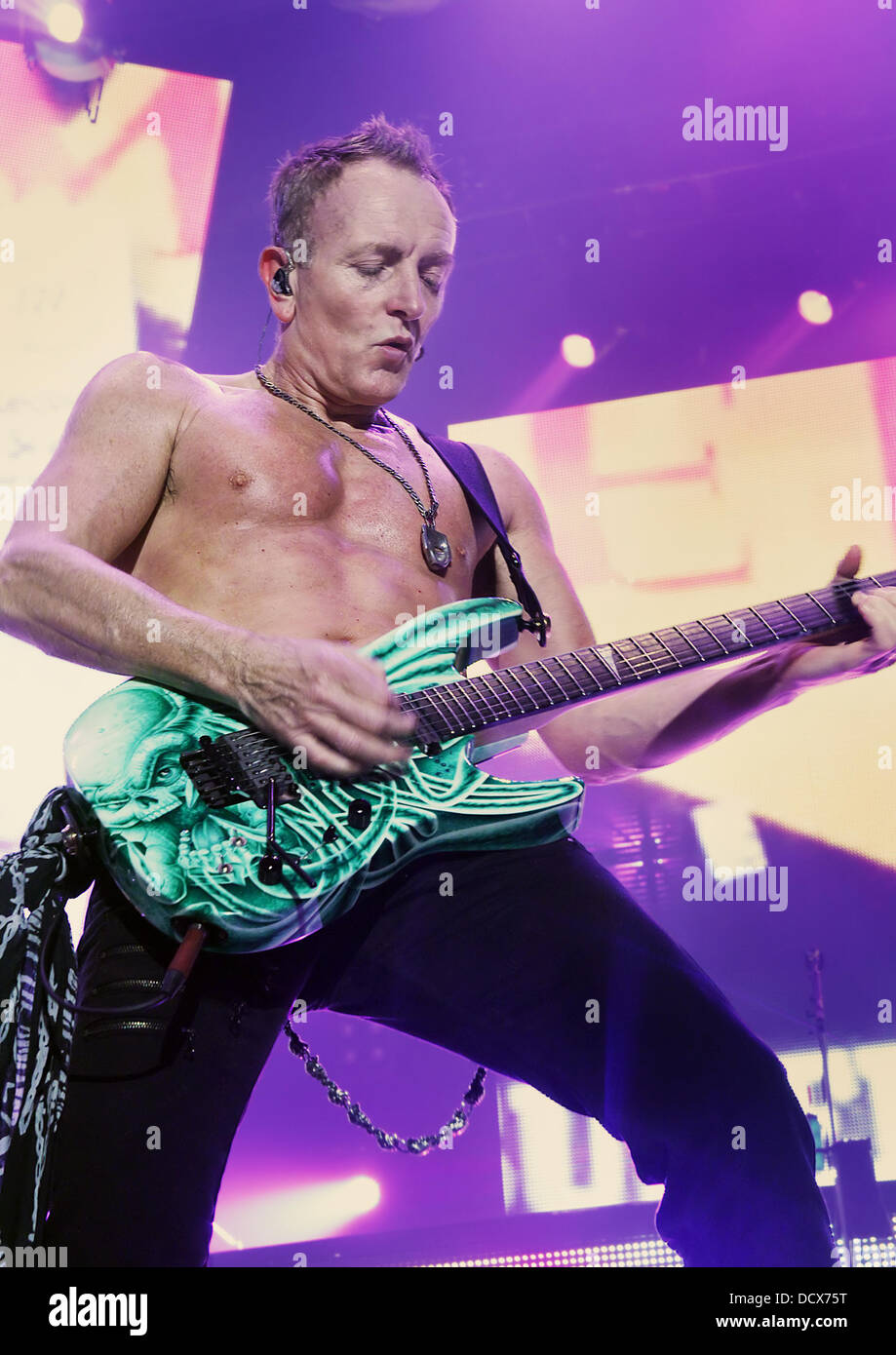 Phil Collen of Def Leppard performing live at Manchester Evening News ...