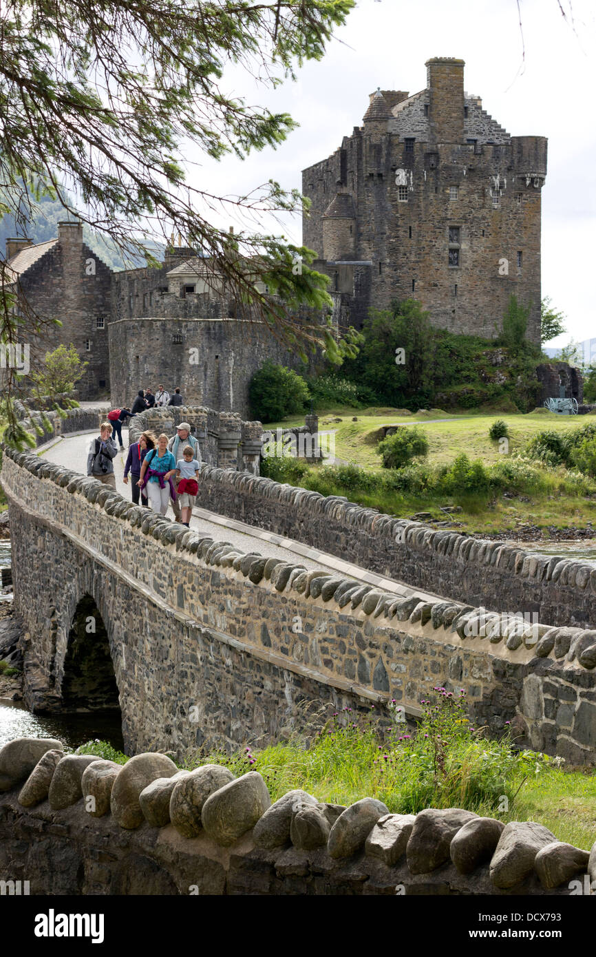 Tourists visiting Eilean Donan Castle at Dornie Highlands Scotland UK ...