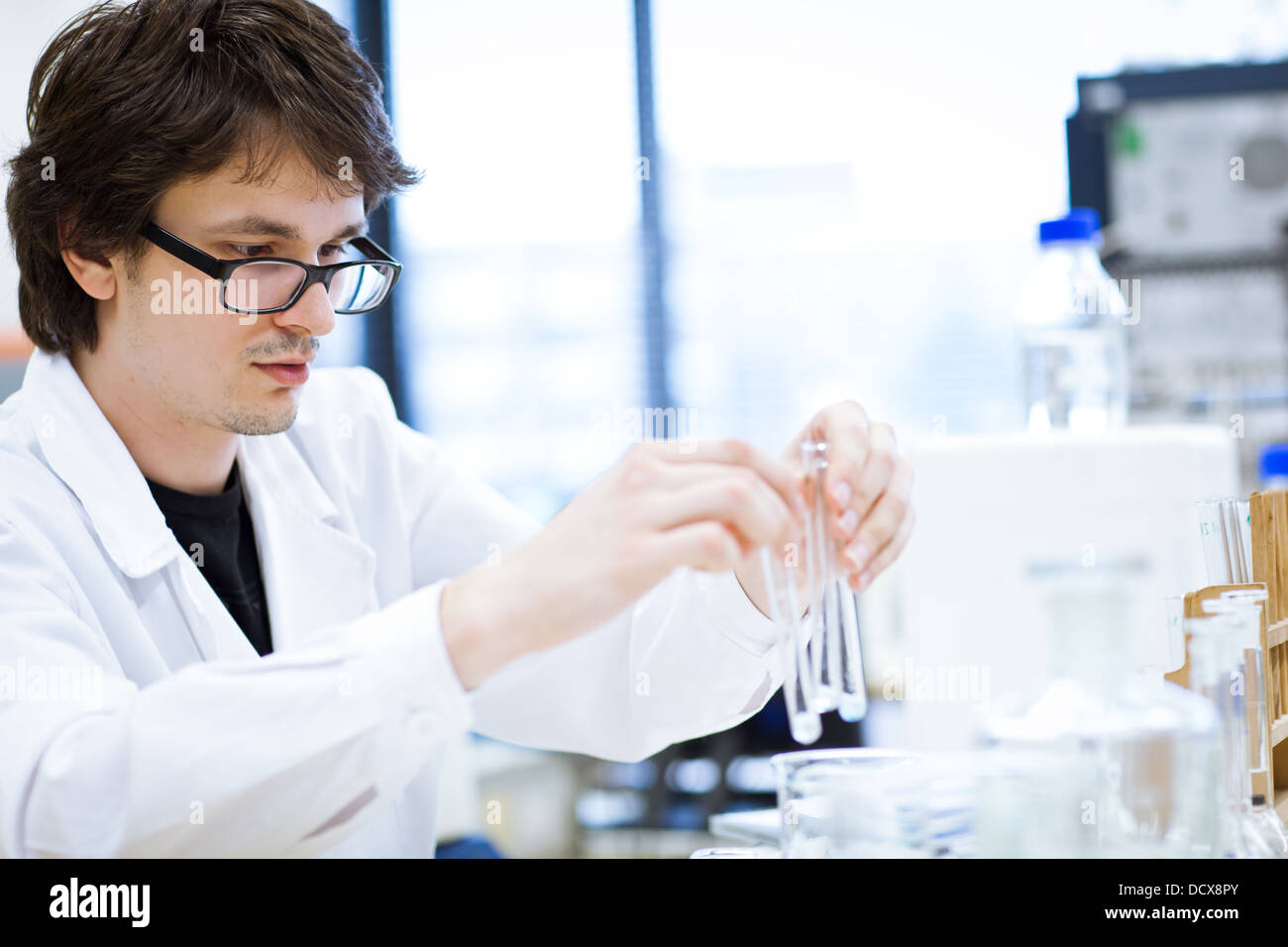 young, male researcher/chemistry student Stock Photo - Alamy