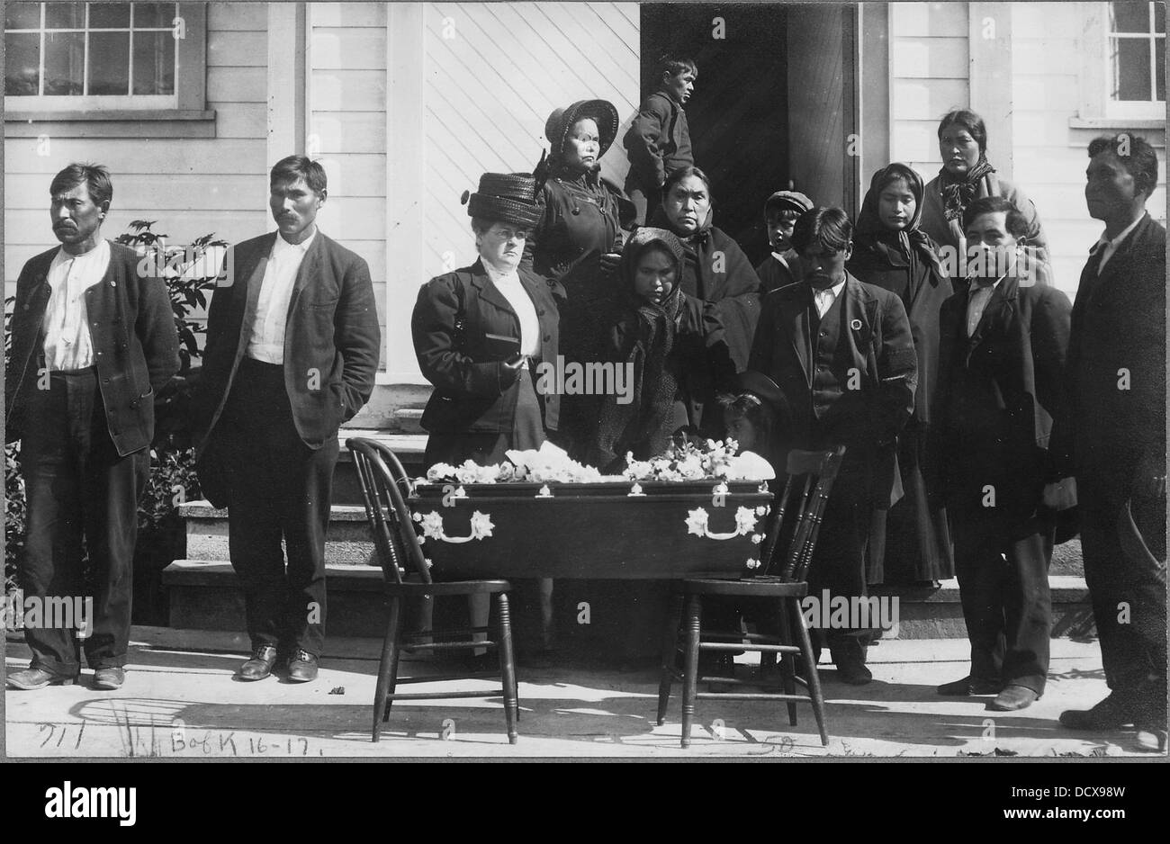 A funeral for a child is held in Metlakahtla, Alaska. The photograph ...