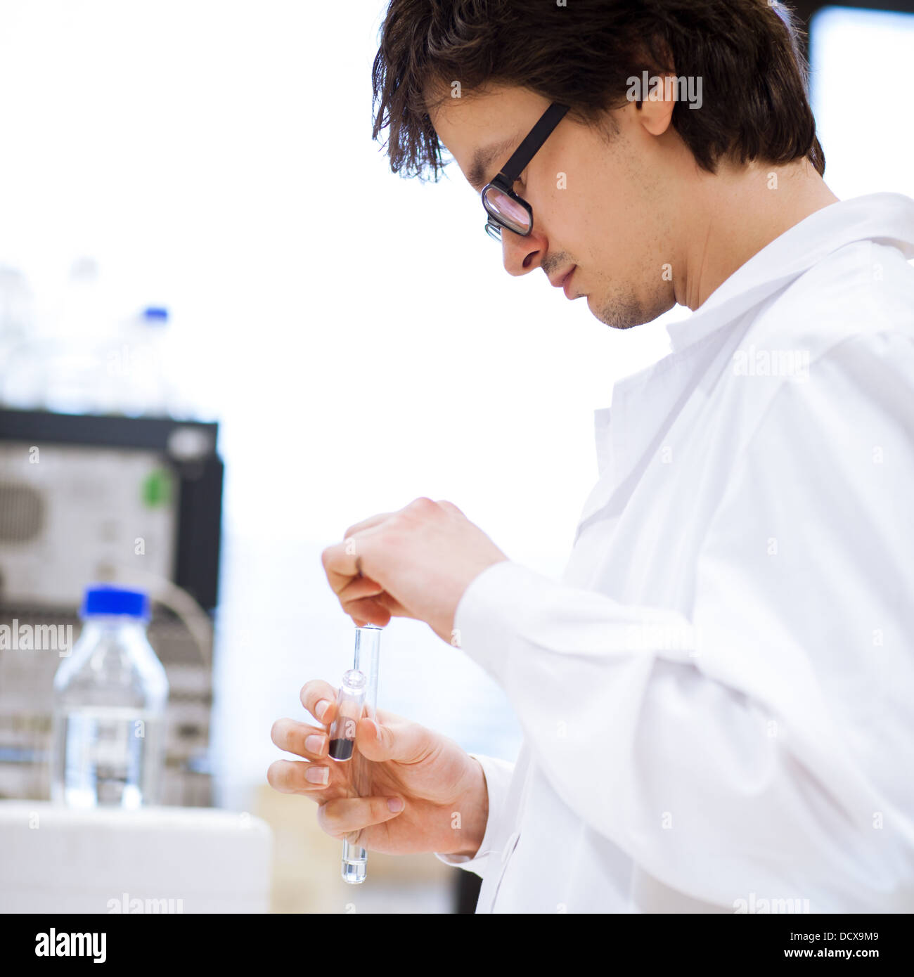 young, male researcher/chemistry student Stock Photo - Alamy