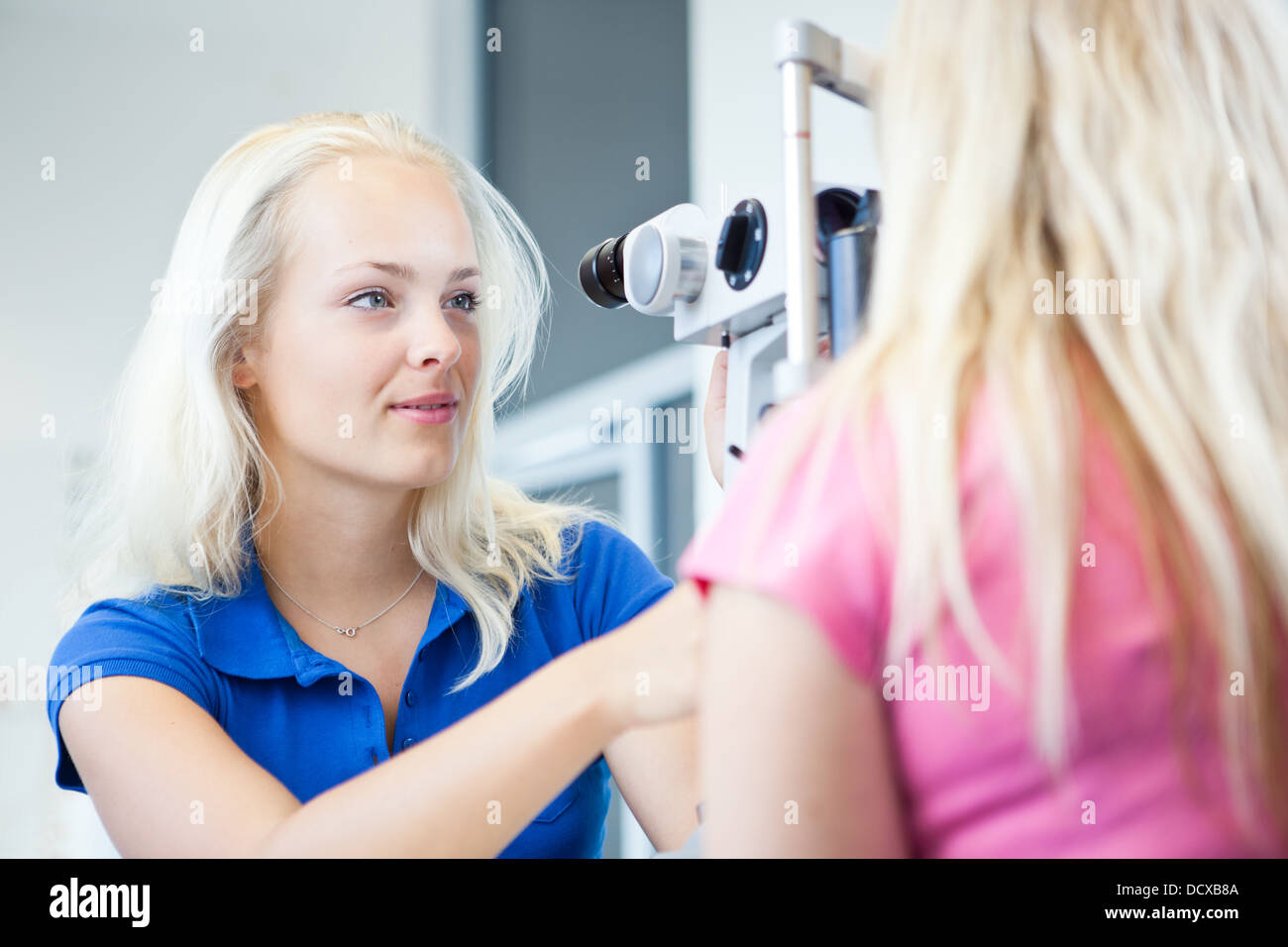 optometry concept - pretty, young female patient Stock Photo - Alamy