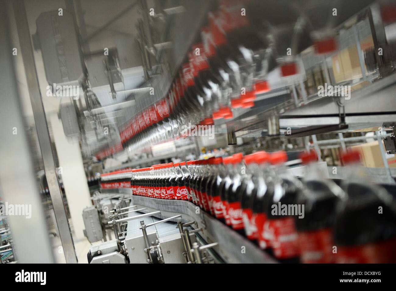 Coca-Cola bottles are pictured on the production line in the bottling ...