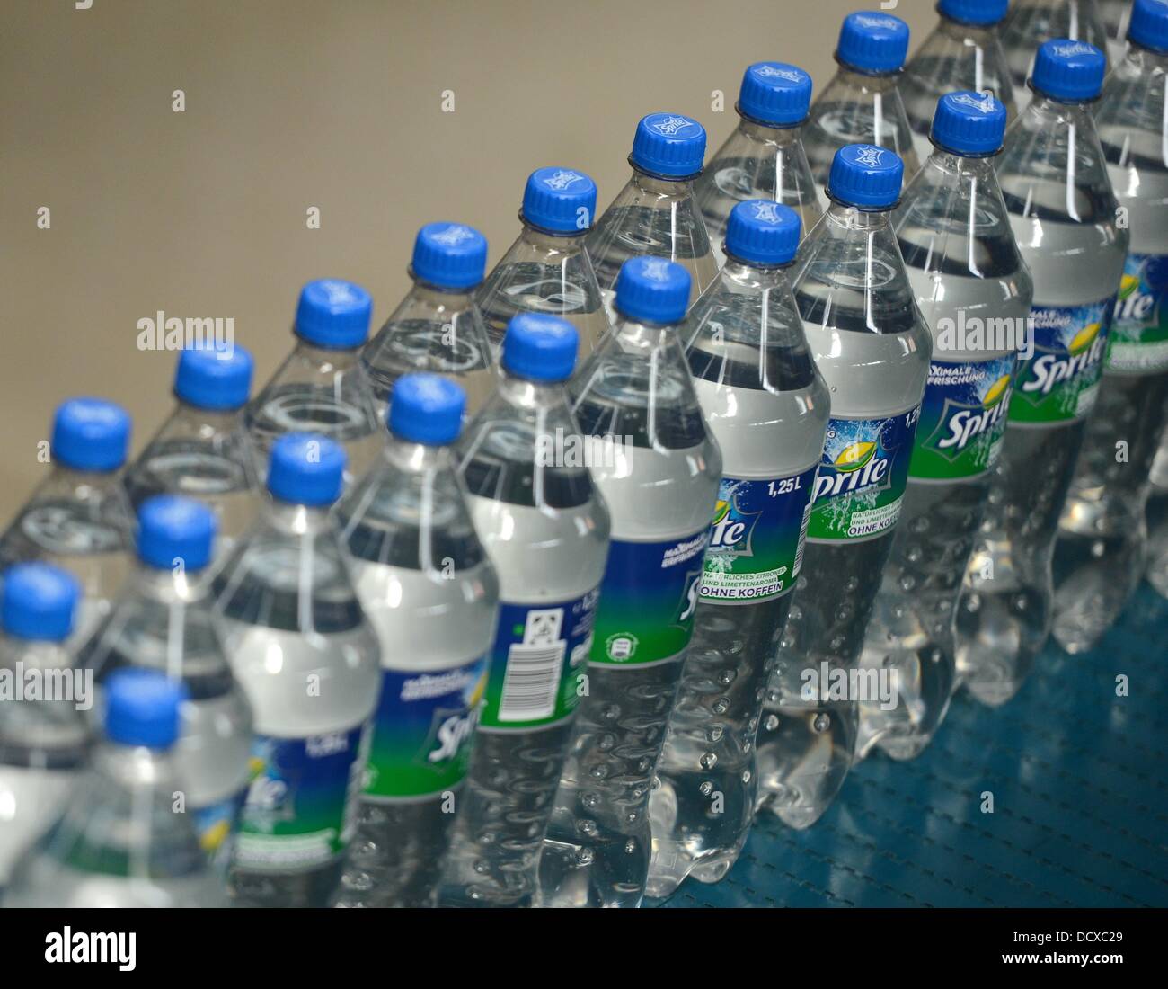 Sprite bottles are pictured on the production line in the bottling ...
