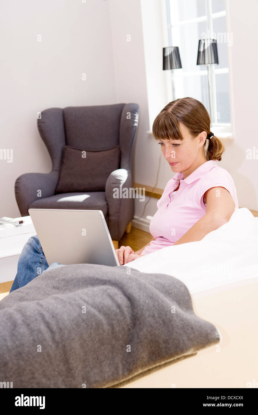 Woman with computer Stock Photo - Alamy