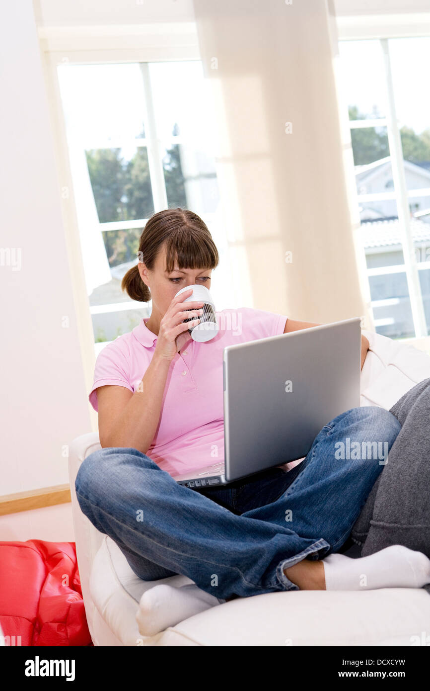 Woman with computer Stock Photo - Alamy