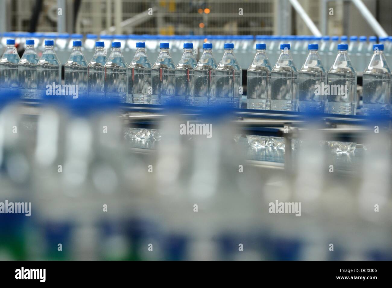Bottles are pictured on the production line in the bottling plant of ...