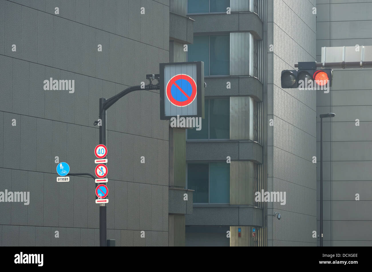 Traffic signs and a traffic light Stock Photo - Alamy
