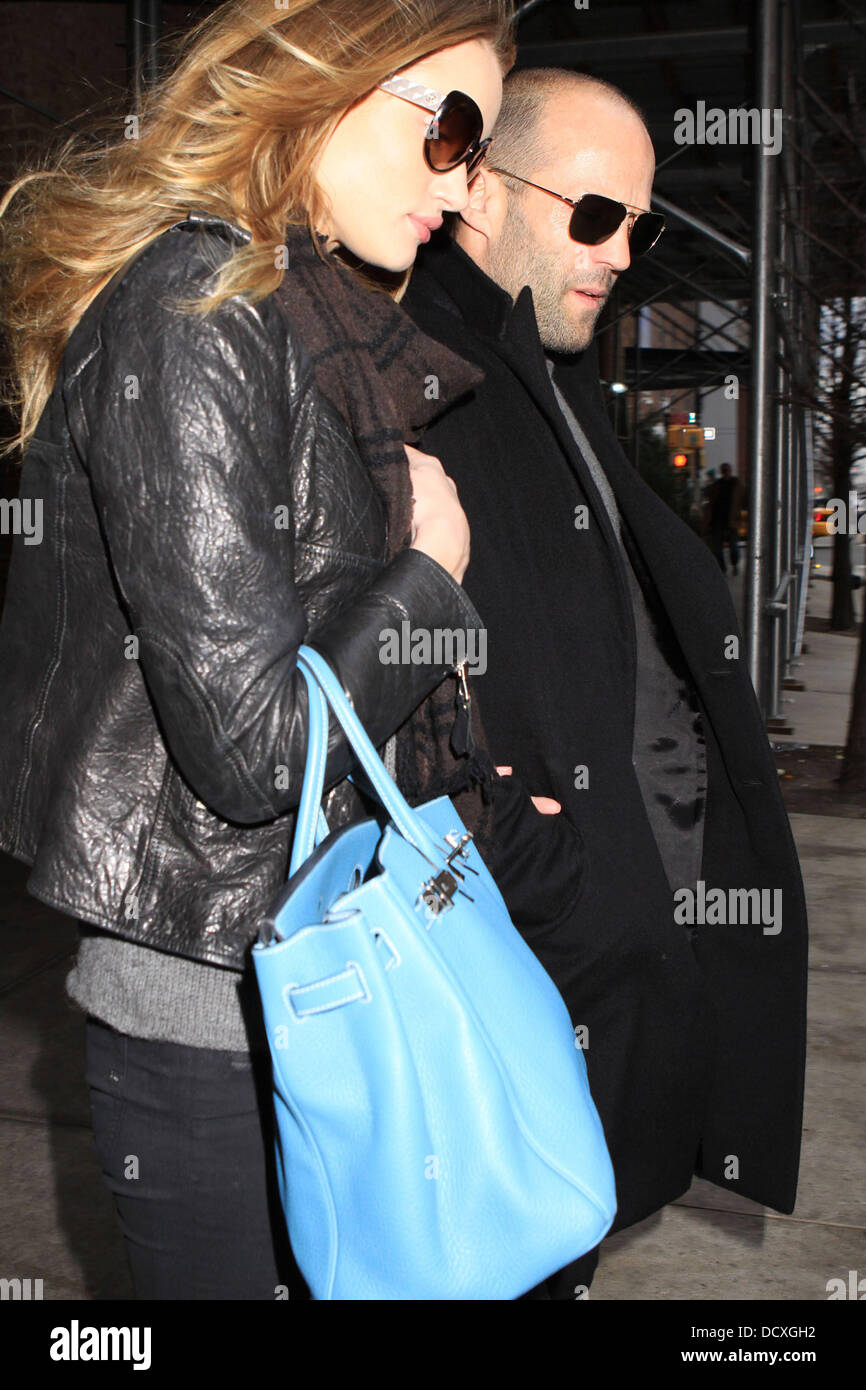 Jason Statham and Rosie Huntington-Whiteley leave a hotel on a cold ...
