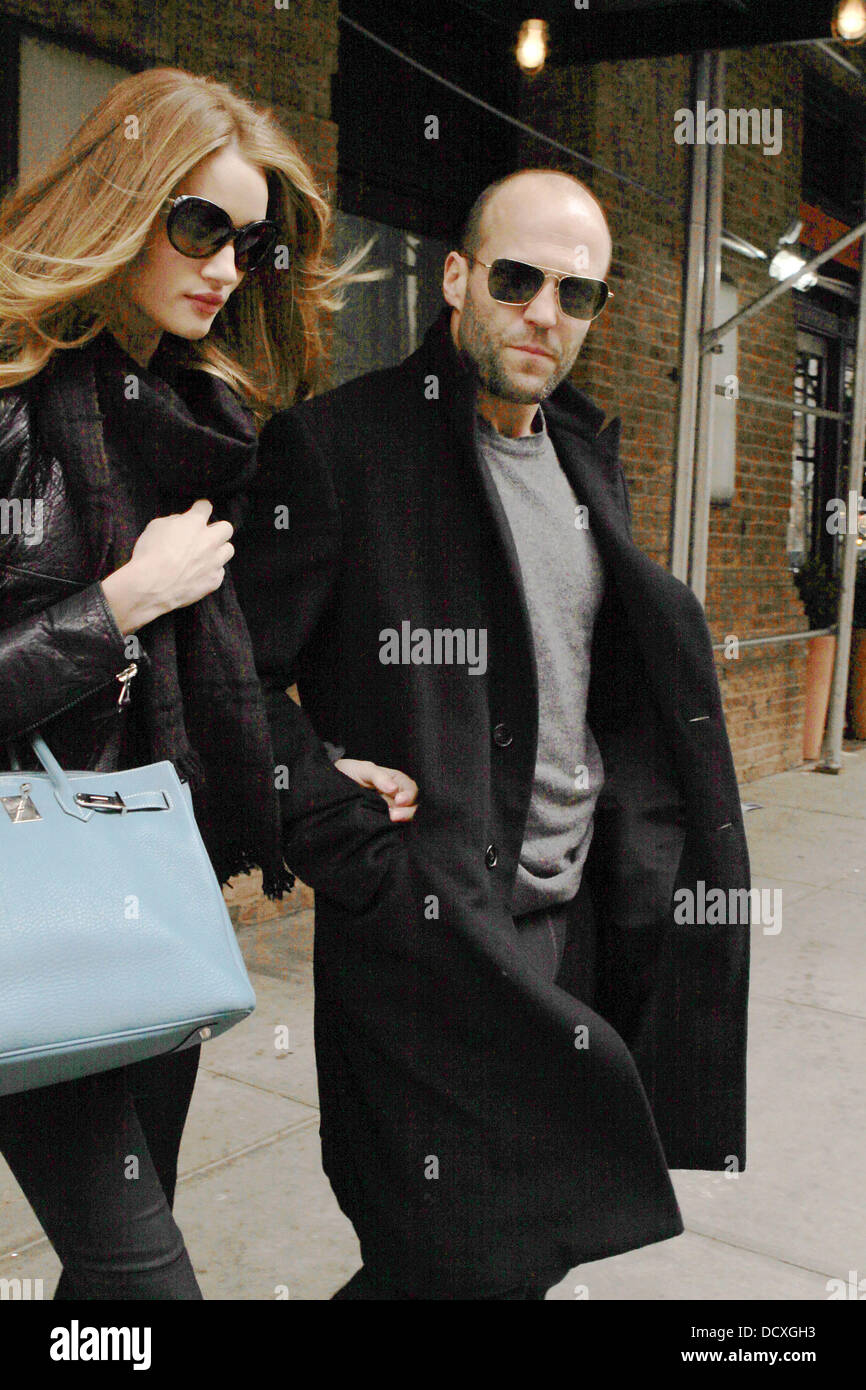 Jason Statham and Rosie Huntington-Whiteley leave a hotel on a cold ...