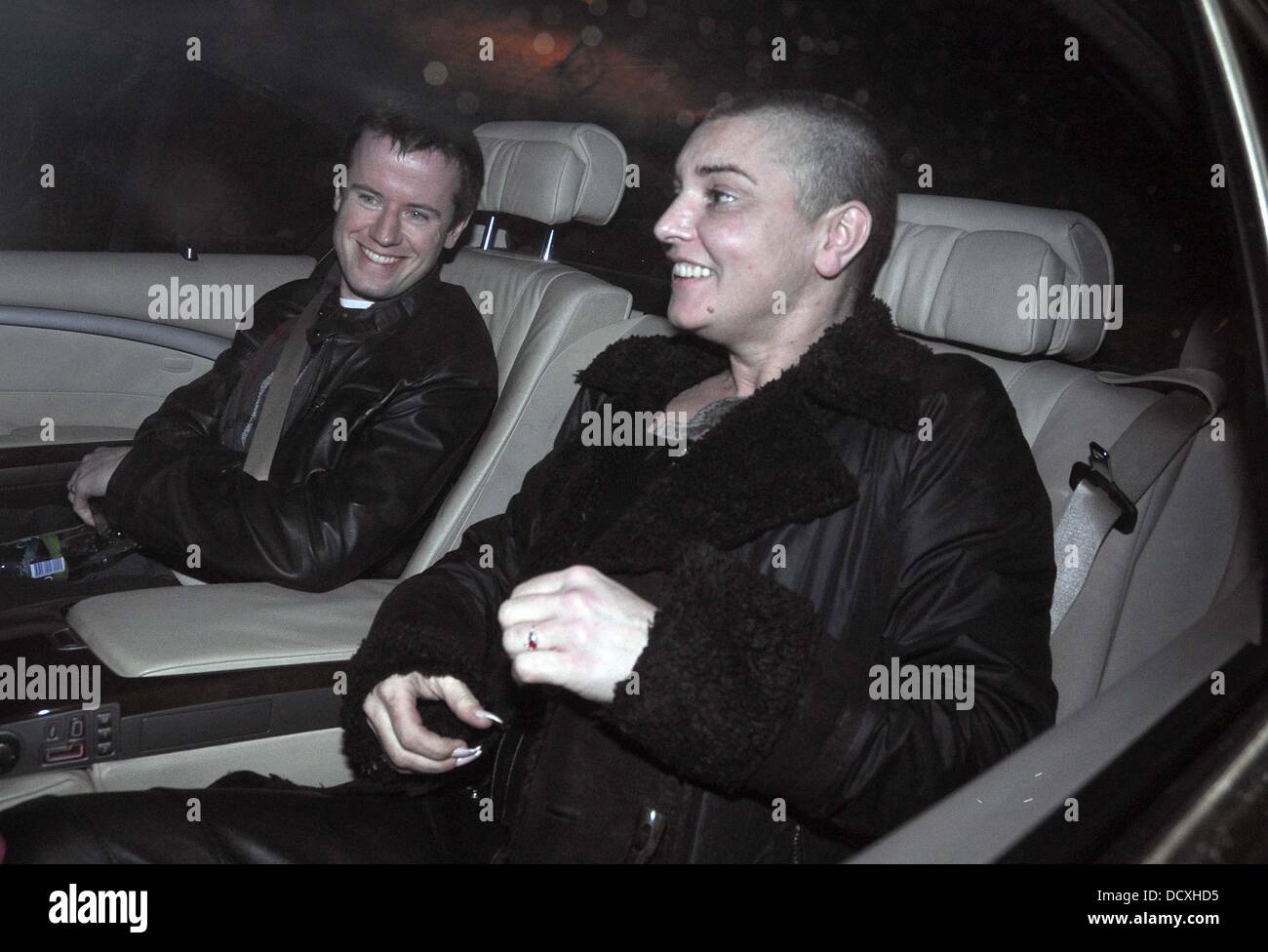 Sinead O'Connor and her new husband Barry Herridge exit the stage door ...