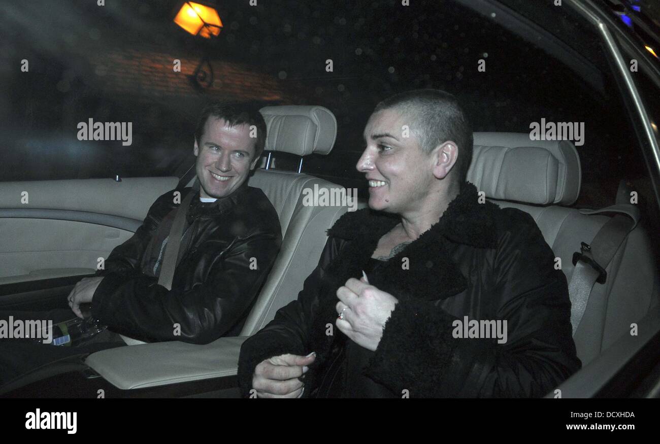 Sinead O'Connor and her new husband Barry Herridge exit the stage door ...