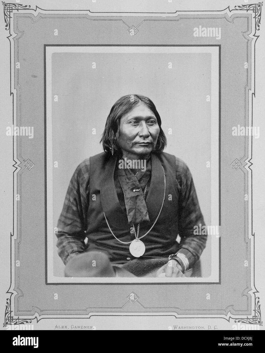 This image features a Comanche individual wearing gray leggings ...