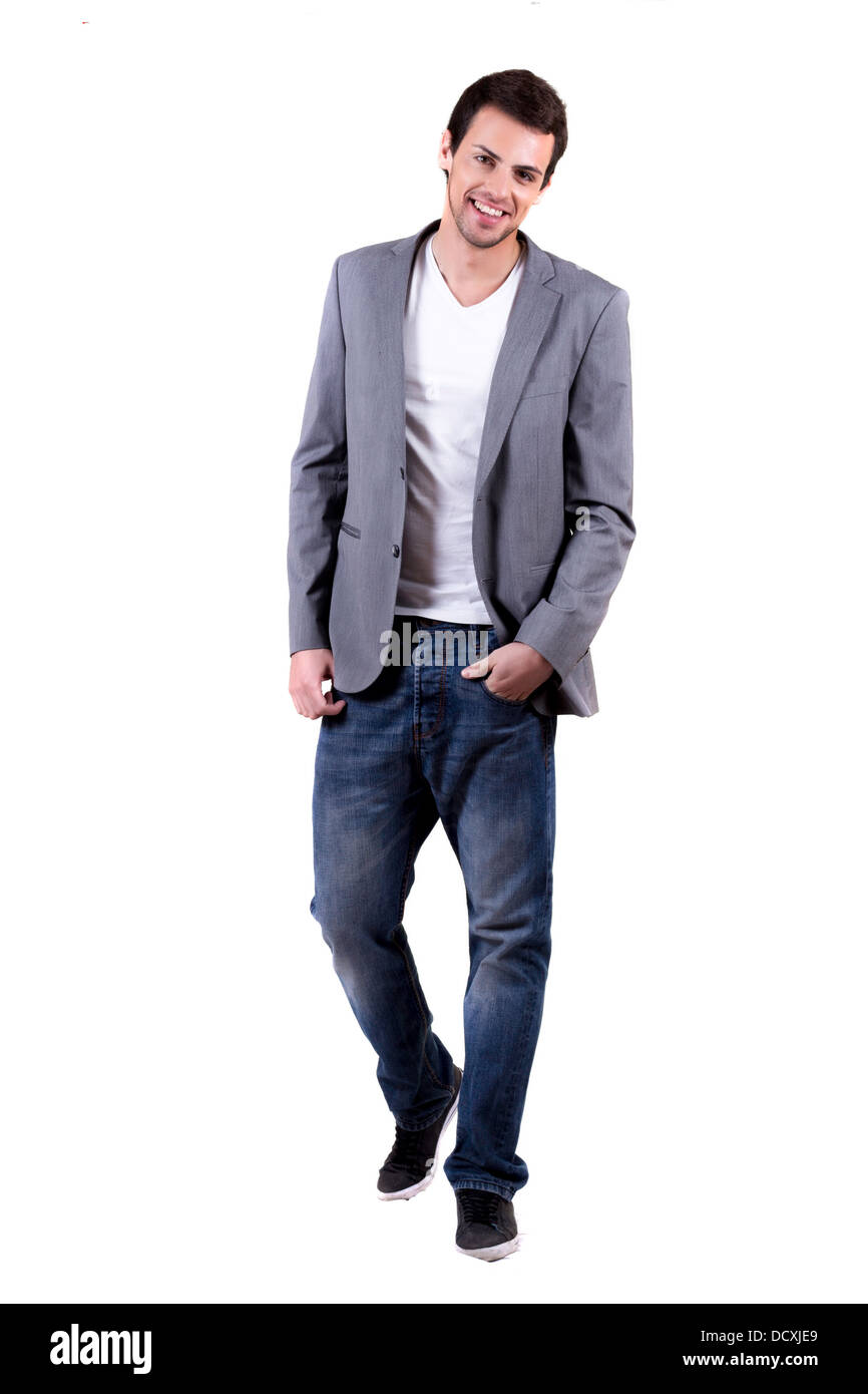 View of a young man standing against a white background Stock Photo - Alamy