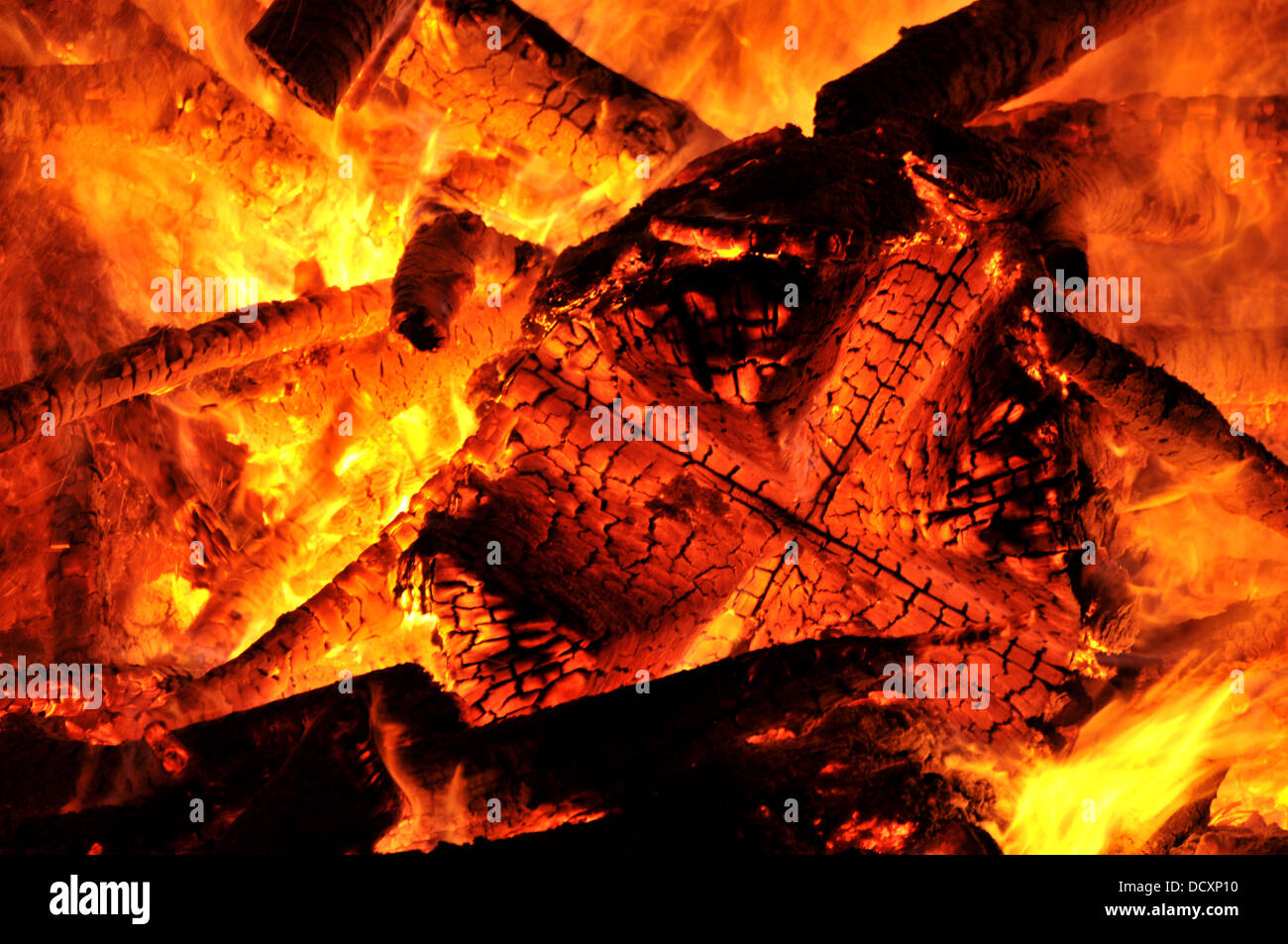 Burning Wood at night Stock Photo - Alamy