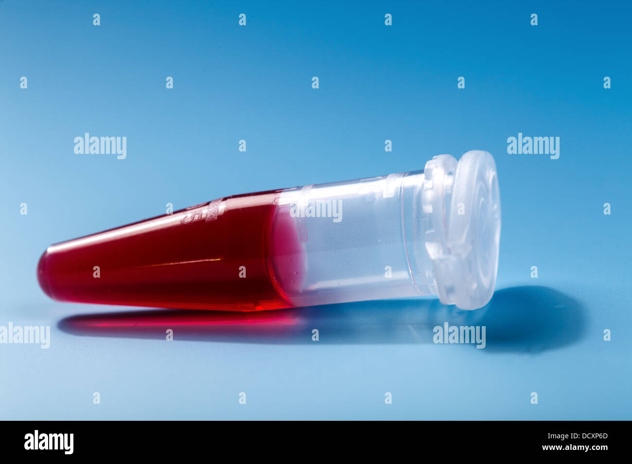 plastic microtube with red fluid Stock Photo - Alamy