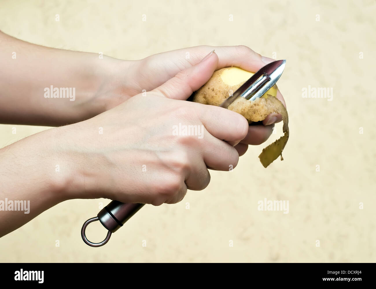 hands peeling potato Stock Photo - Alamy