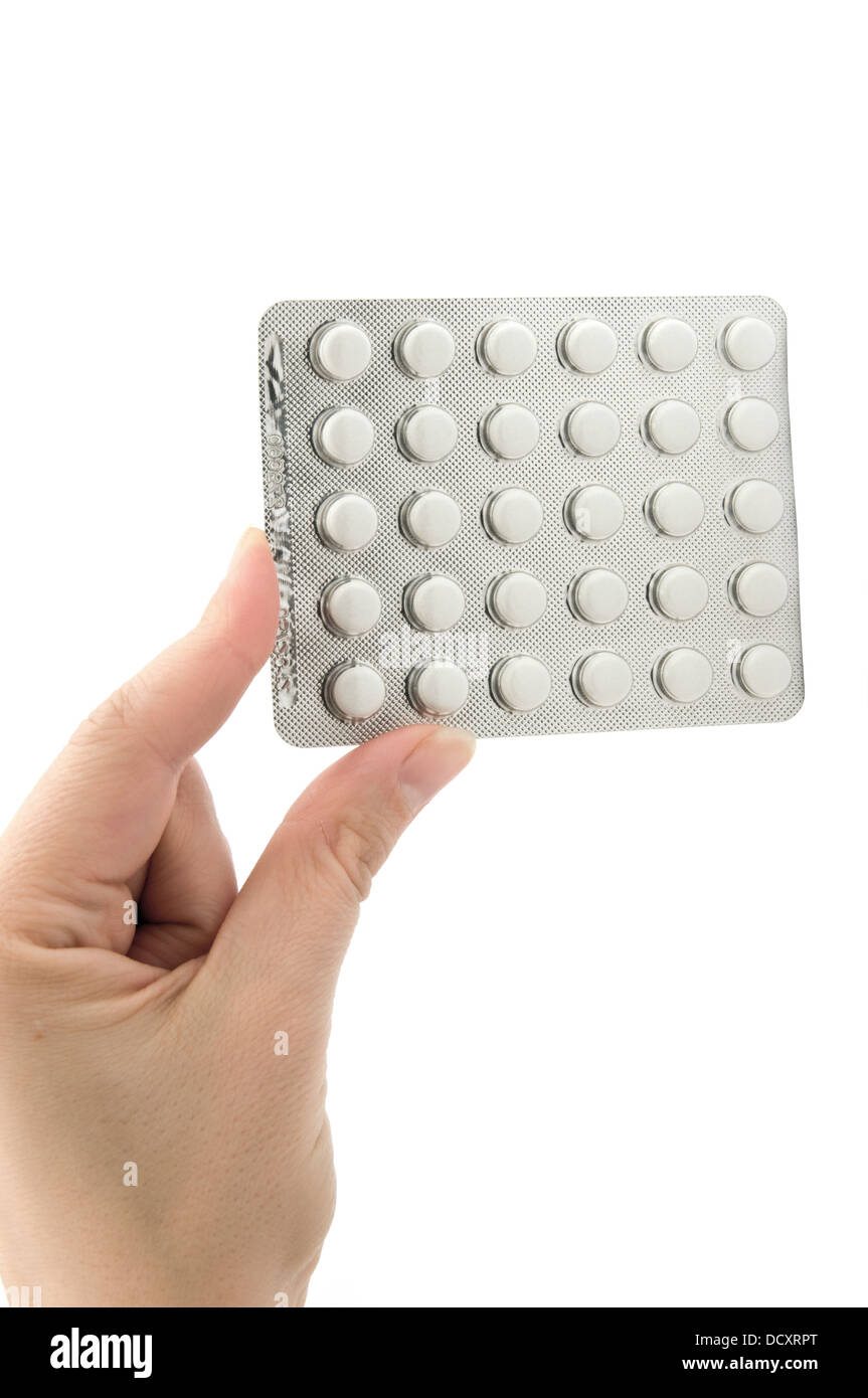 hand and pills Stock Photo - Alamy