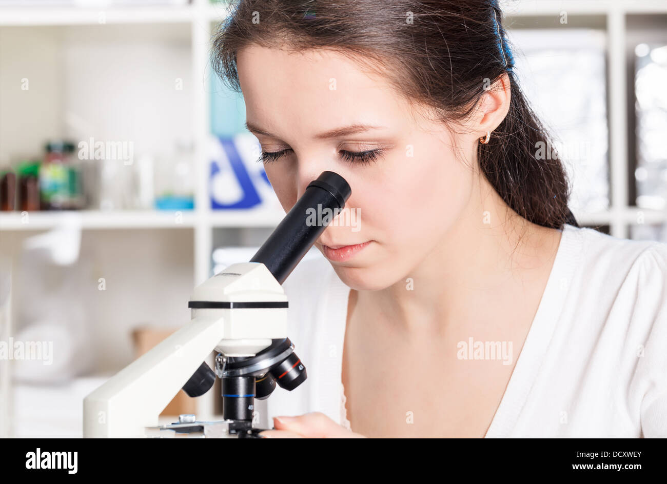 student girl and microscope in laboratory Stock Photo - Alamy