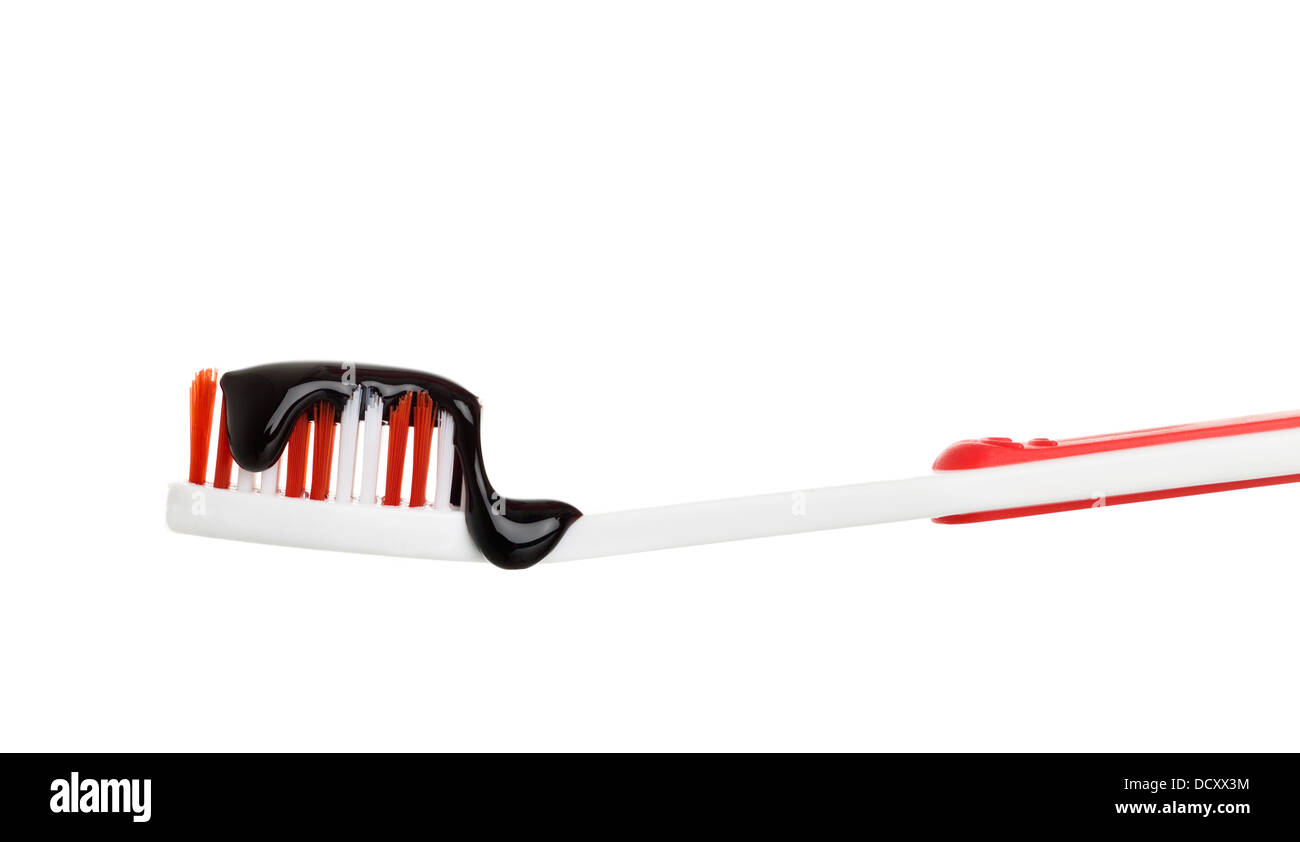 Toothbrush with chocolate sauce Stock Photo - Alamy