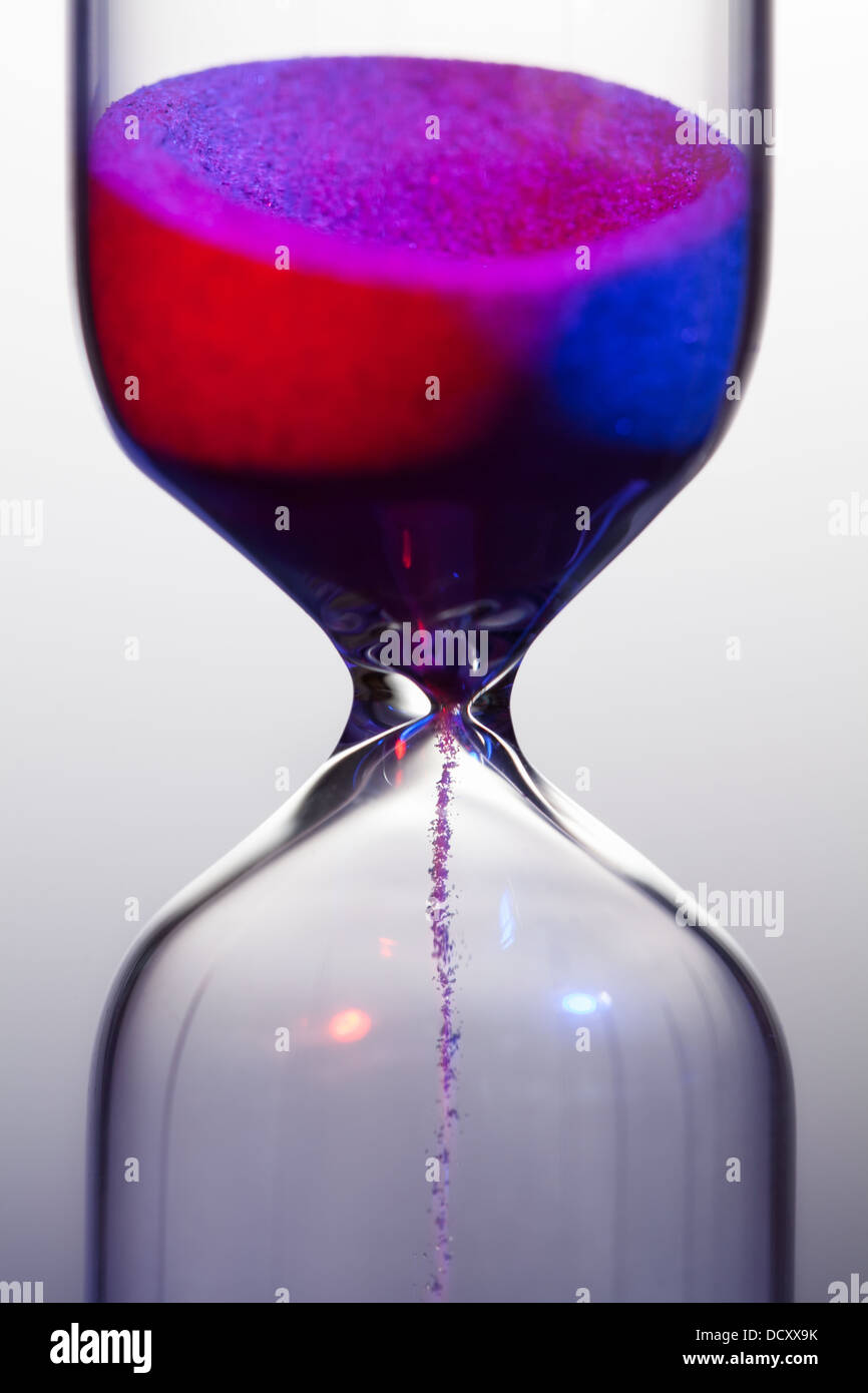 sand watch macro closeup flow color Stock Photo - Alamy