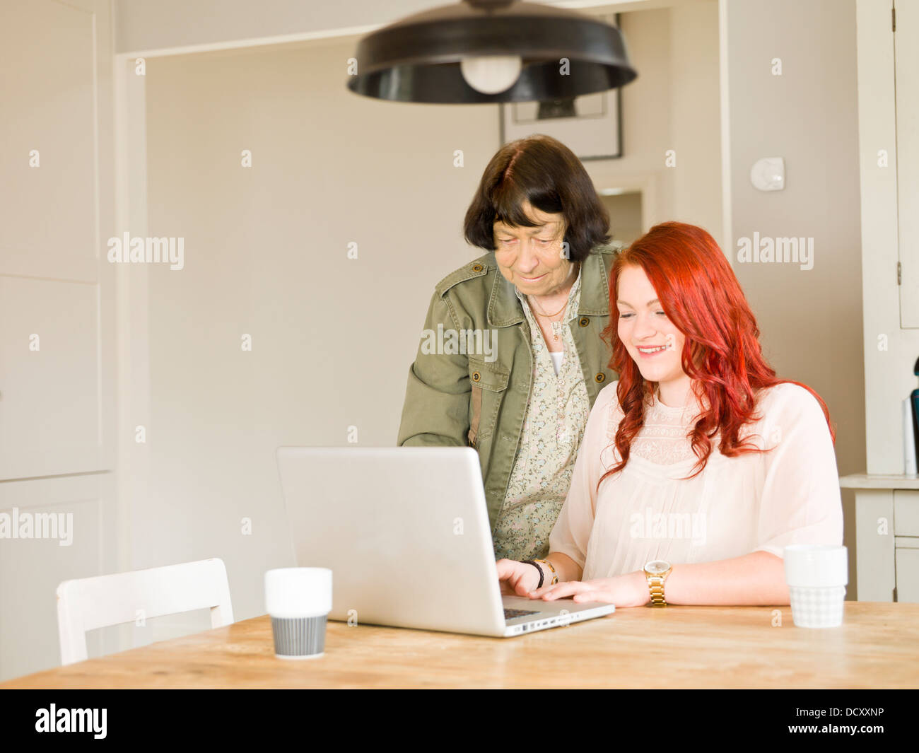 Women with computer Stock Photo - Alamy