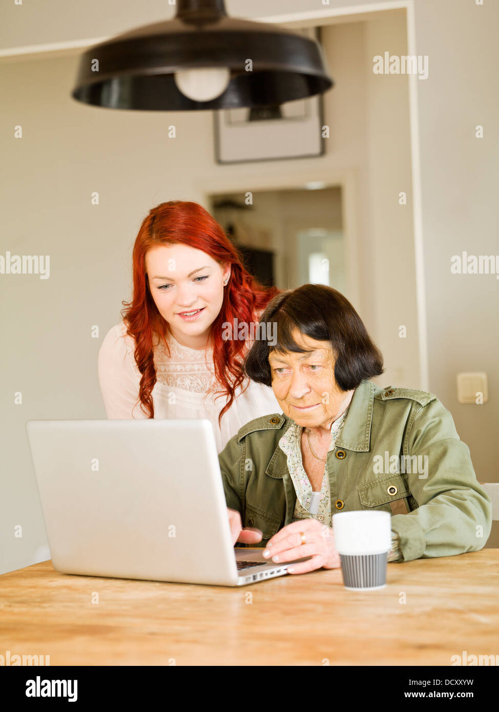 Women with computer Stock Photo - Alamy