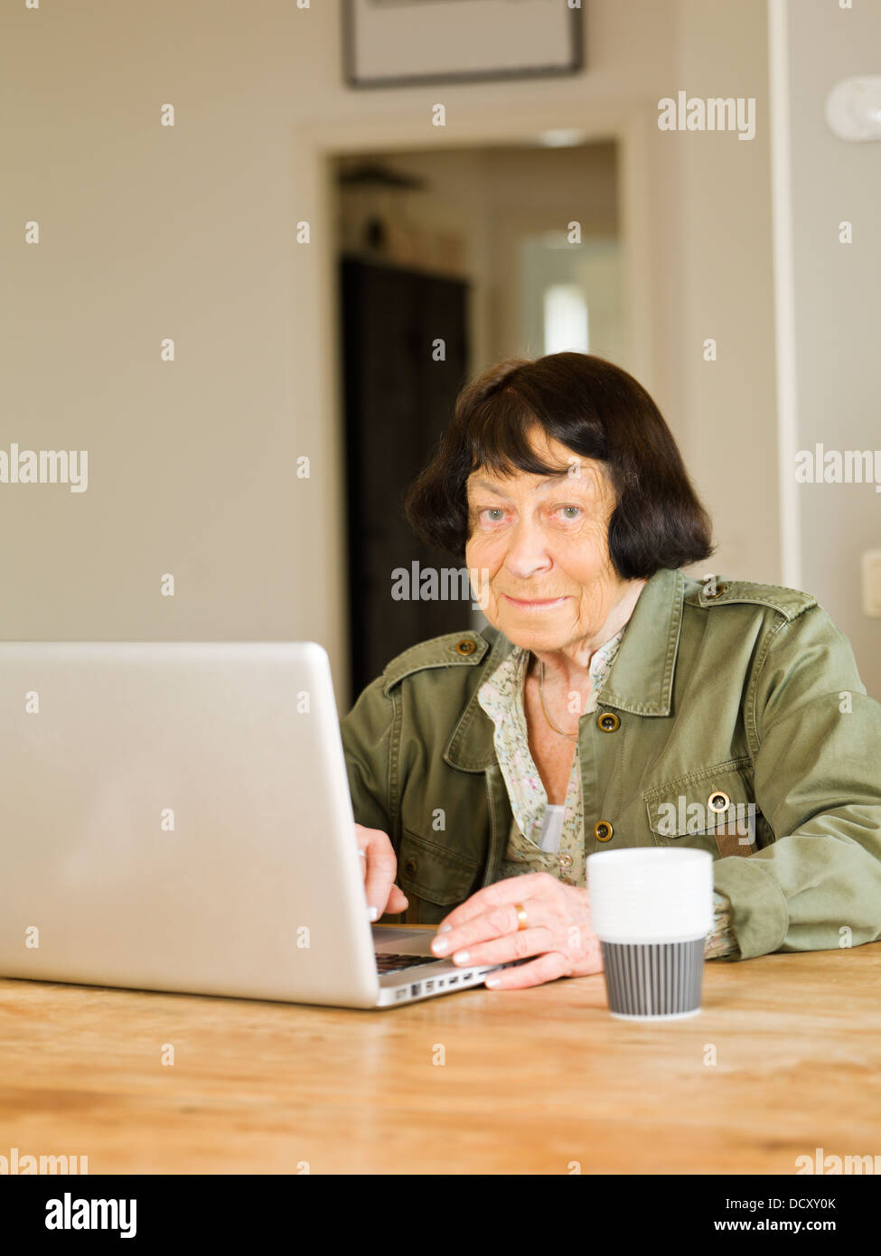 Woman with computer Stock Photo - Alamy