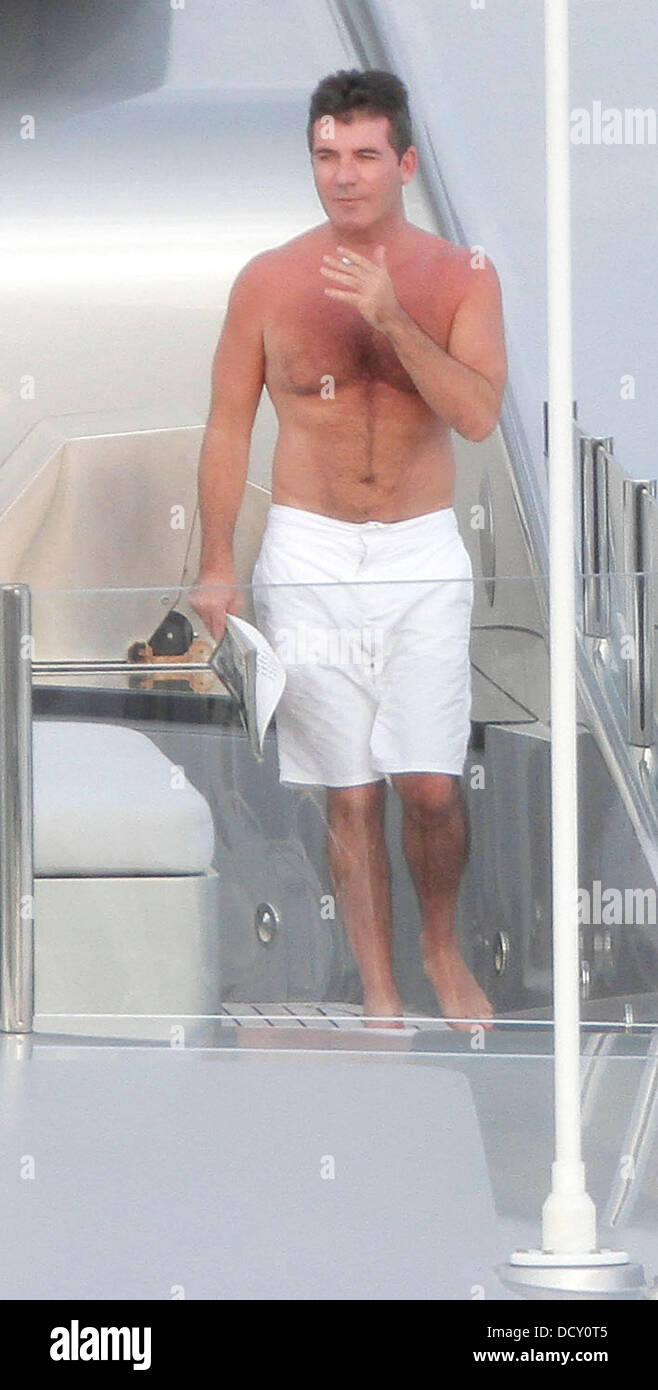 Simon Cowell smoking a KOOL brand menthol cigarette as he relaxes ...