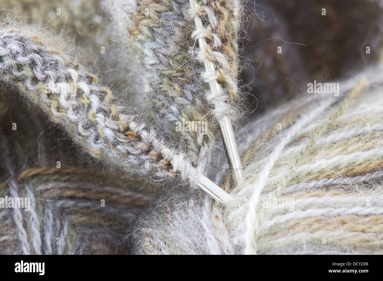 Woollen thread and knitting needle Stock Photo - Alamy