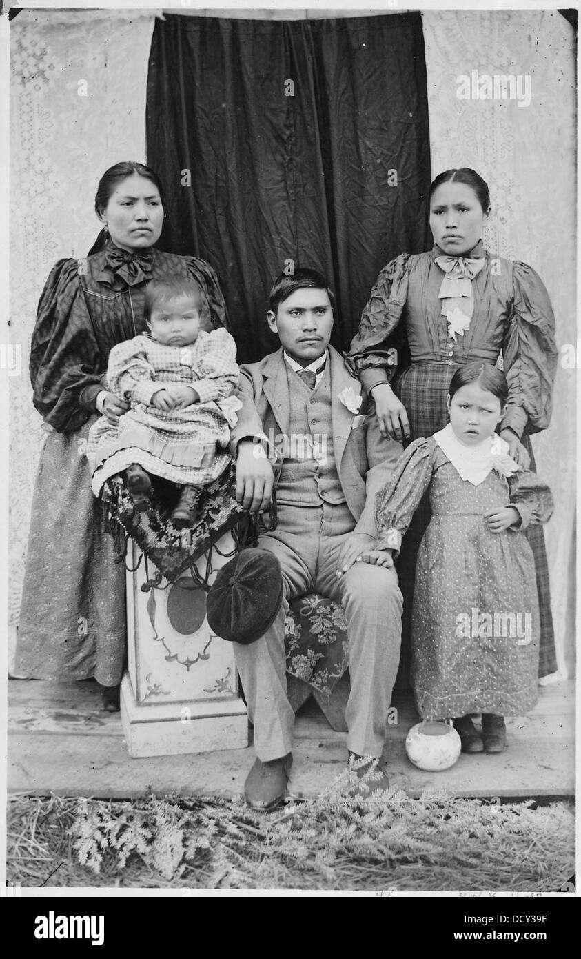 A photograph showing an Indian family, depicting everyday life and ...