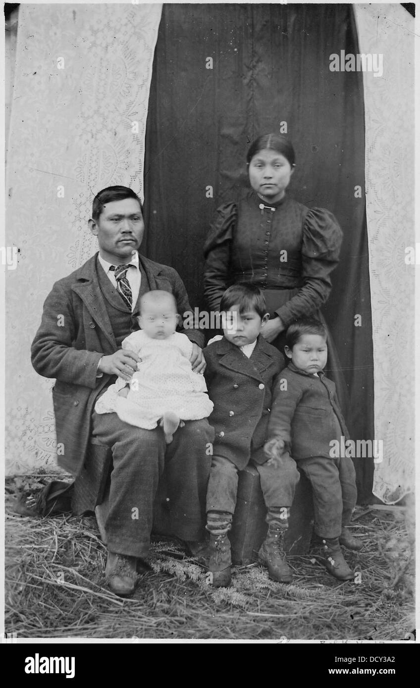 This photograph depicts a Native American family, showcasing their ...